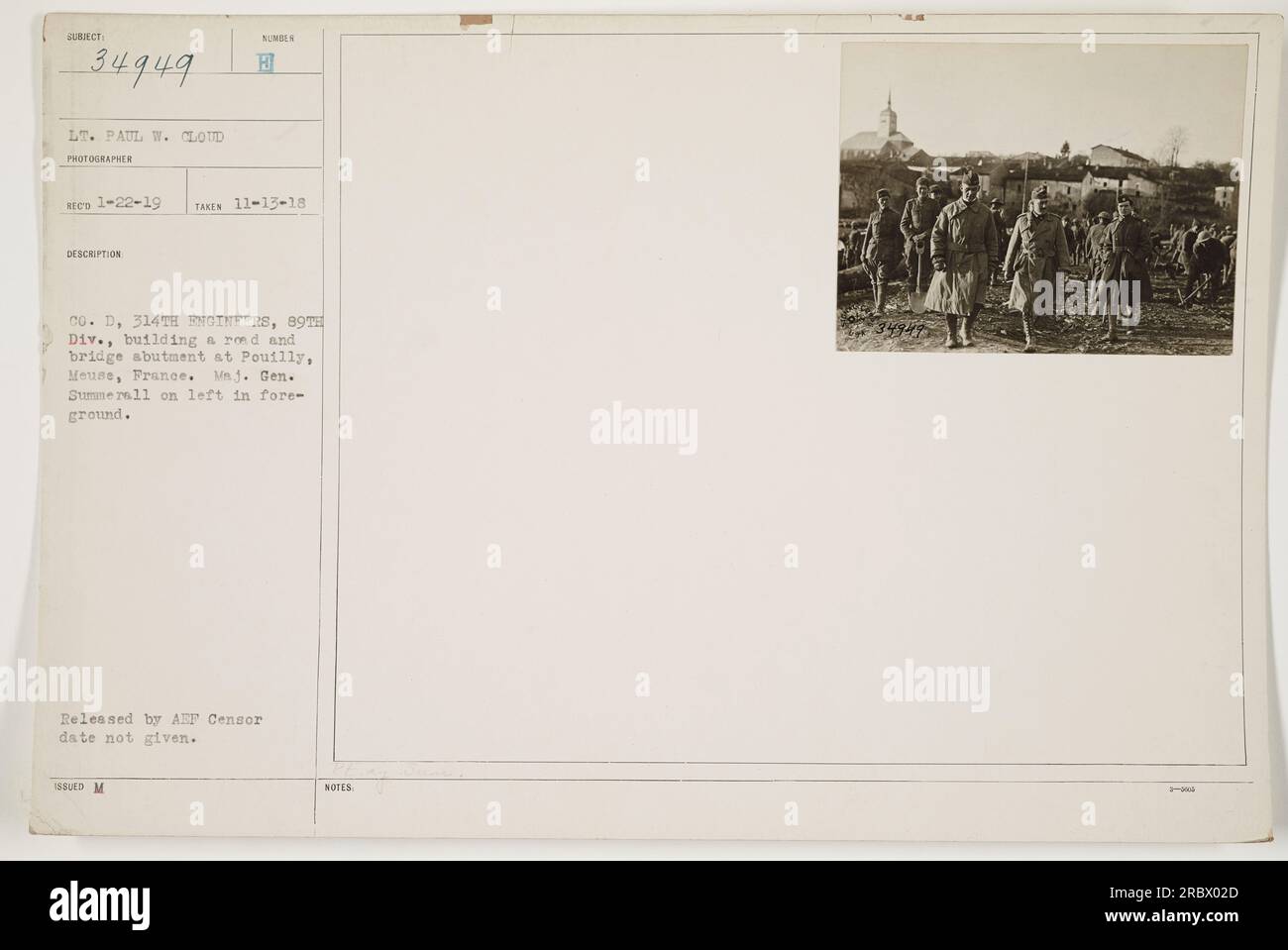 Image depicts Lt. Paul W. Cloud photographing soldiers from H Co. D ...