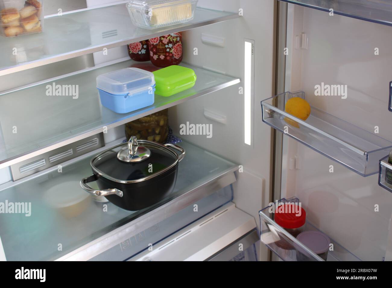 Empty refrigerator. Concept of poverty idea, food crisis, gluten ...