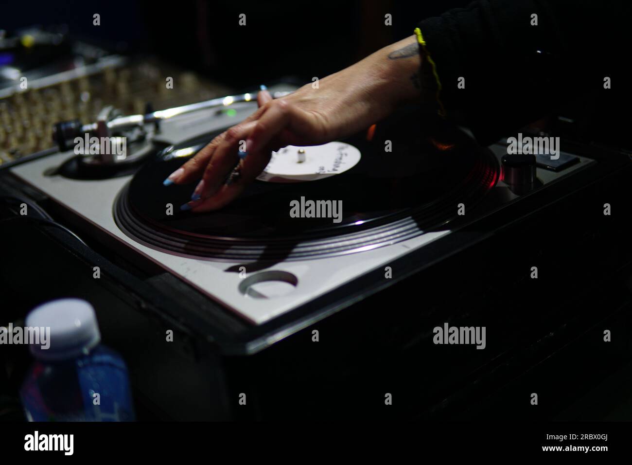 Female hands audio control hi-res stock photography and images - Alamy