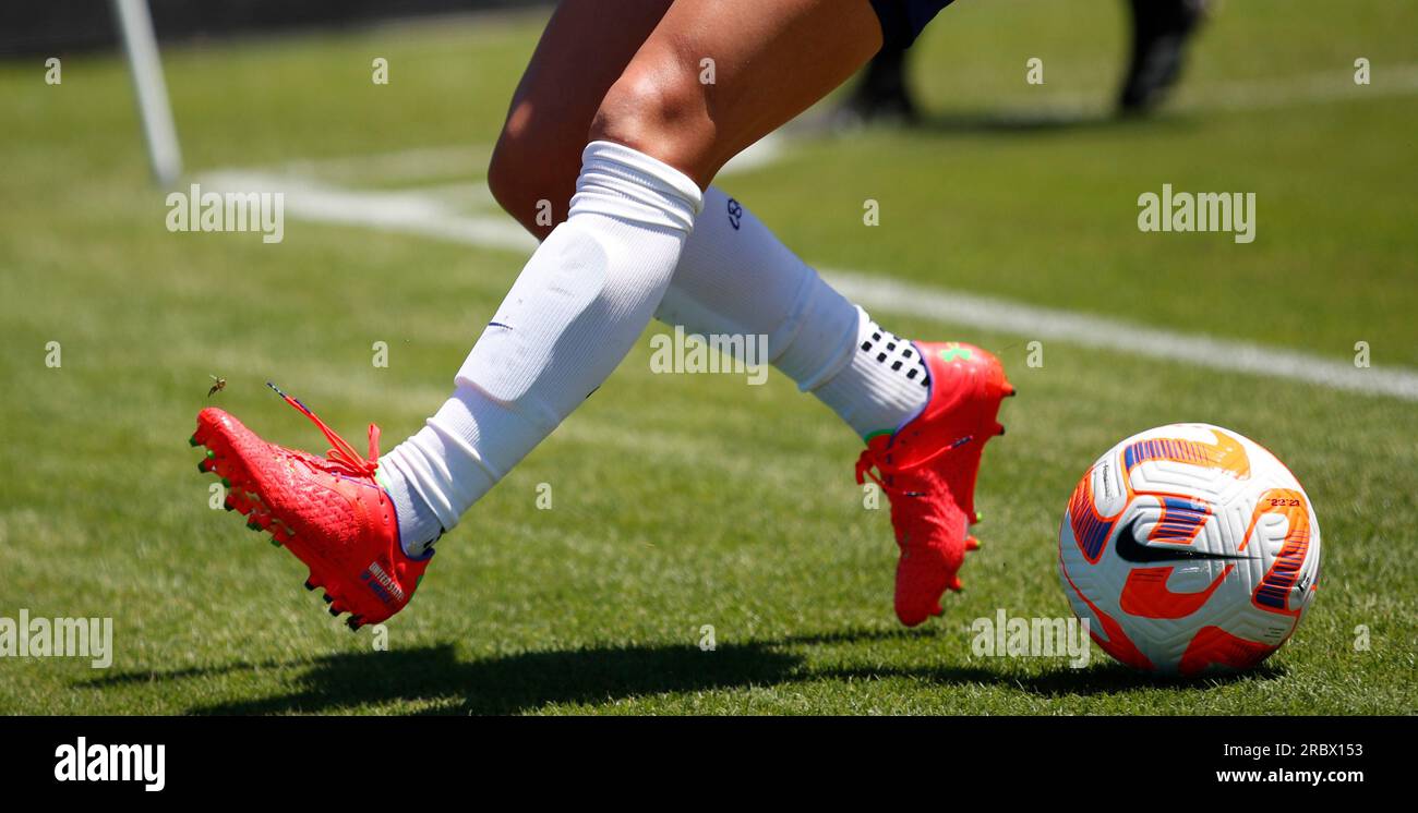 A United States women's national team member takes a shot during a FIFA ...