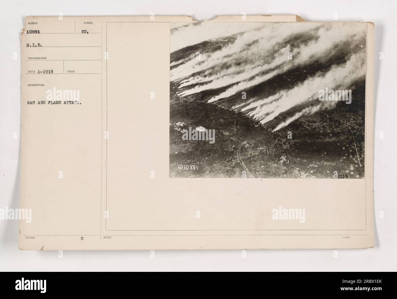 Soldiers wearing gas masks preparing to launch a gas and flame attack ...
