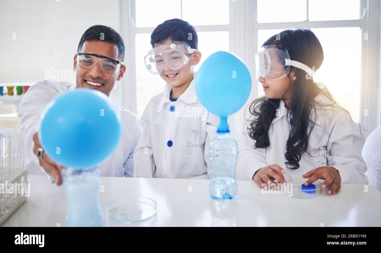 Family, science and father with kids in a laboratory with balloon for ...