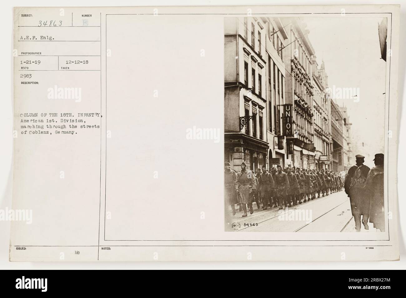 A column of the 18th Infantry, American 1st Division, is seen marching ...