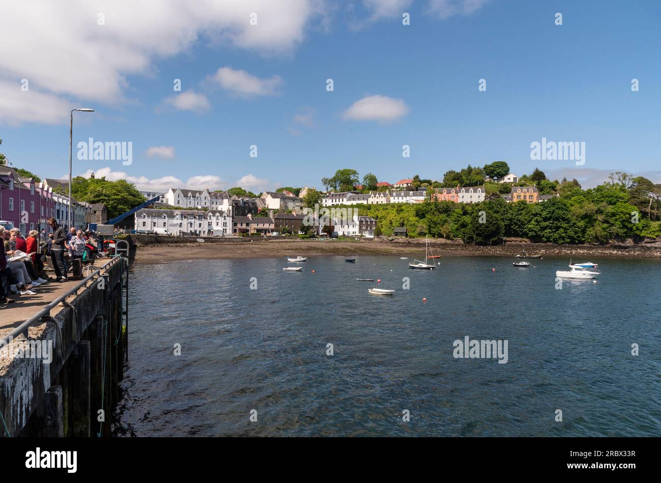 Portree, Isle of Skye, Scotland, UK. 5 June 2023. Portree harbour with colourful houses ...