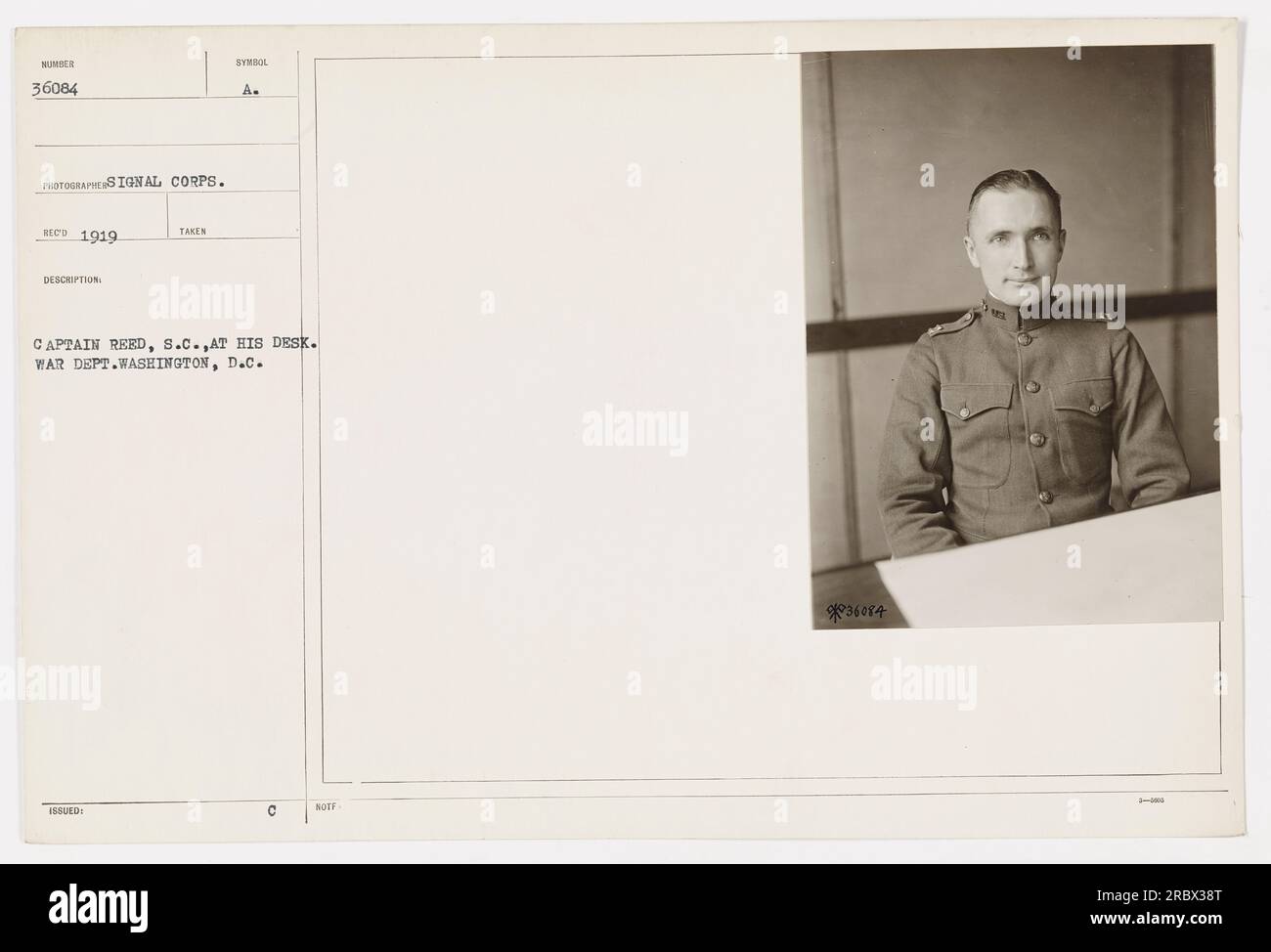 Captain Reed of the Signal Corps at his desk in the War Department ...