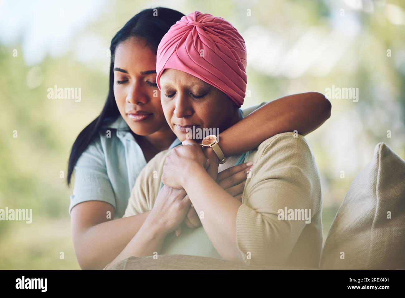 Love, sweet and woman with her mom with cancer hugging, bonding and ...