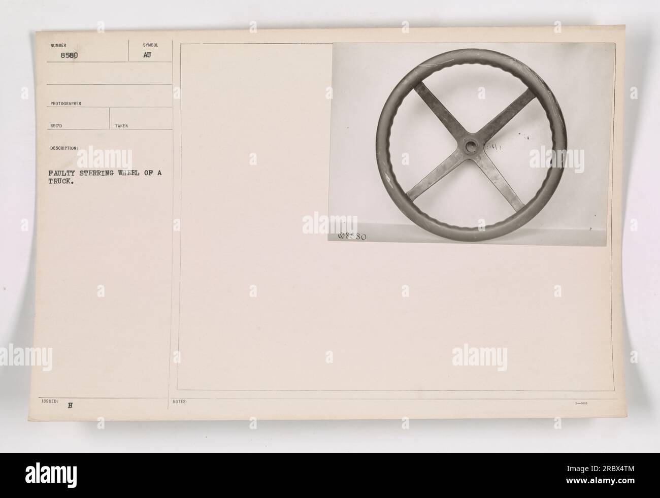 The photograph, titled "111-SC-8580", shows a close-up of a steering ...