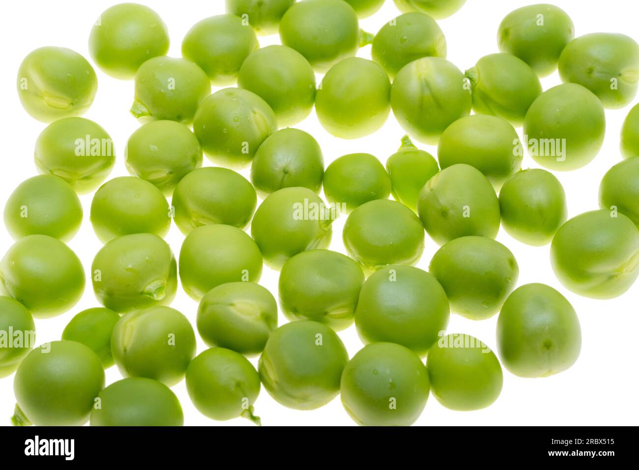 green young peas isolated on white background Stock Photo - Alamy