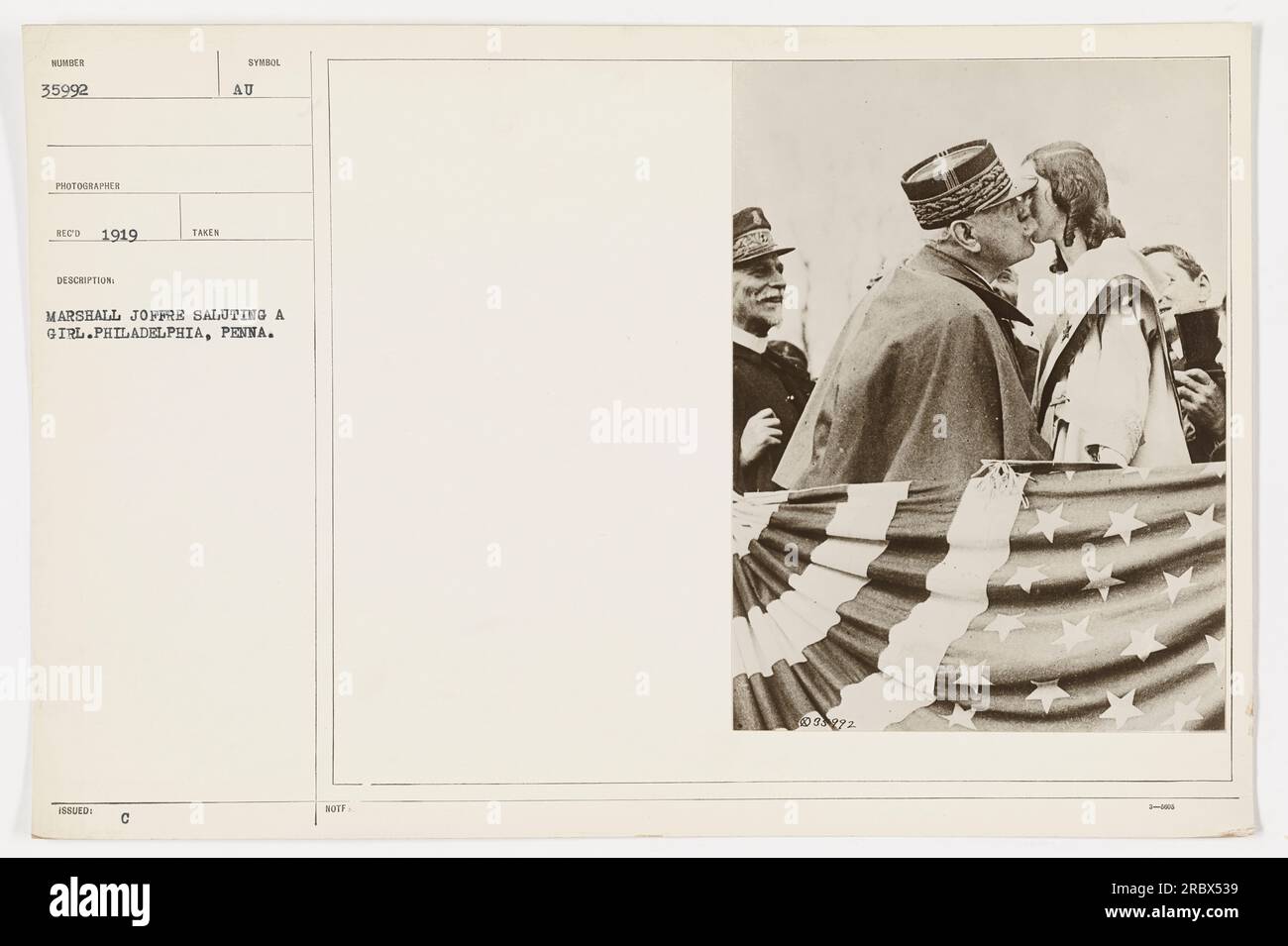 Marshal Joffre salutes a young girl in this photograph taken during ...