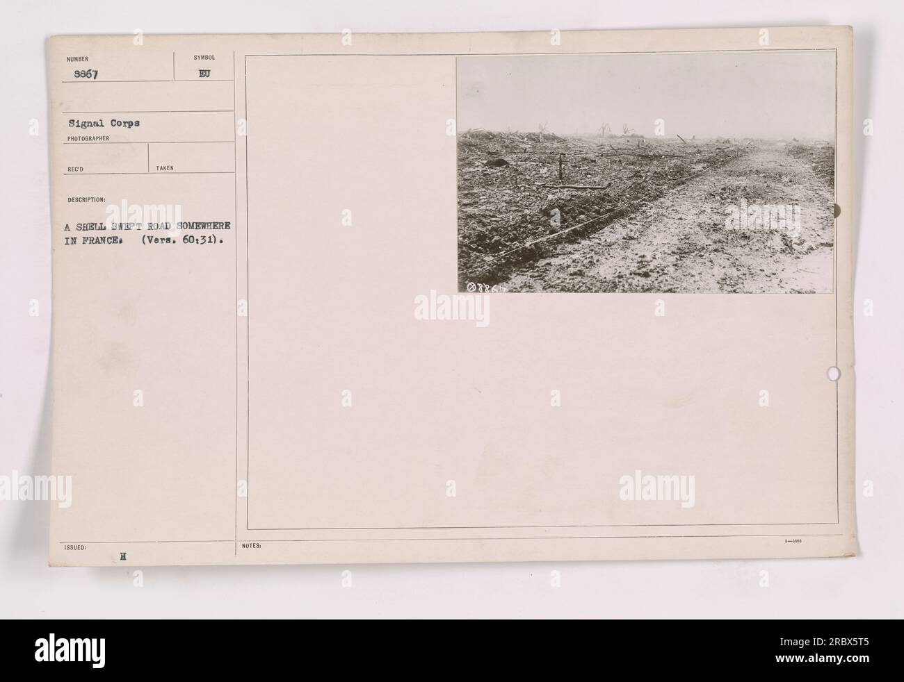 111-SC-8867: A photograph depicting a devastated, shell-swept road in ...