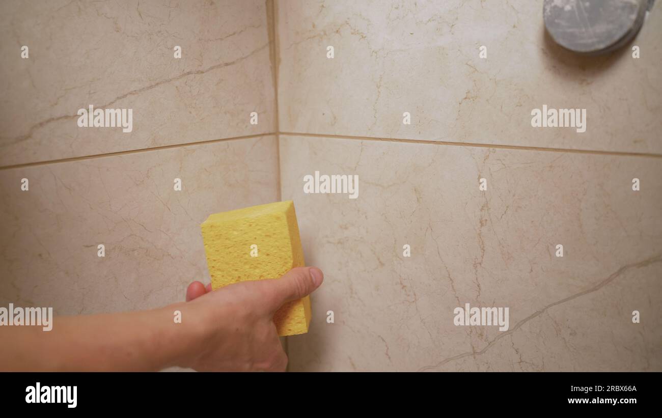 Cleaning tile seams hi-res stock photography and images - Alamy