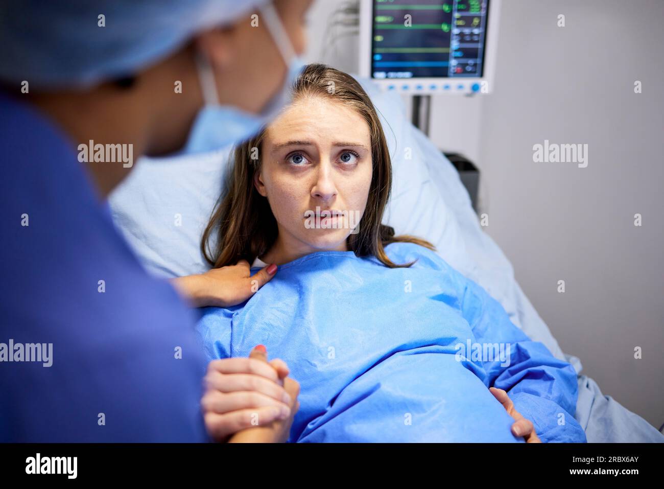 Pregnant woman, hospital and labor with push, holding hands or midwife ... Pregnant woman, hospital and labor with push, holding hands or midwife ...