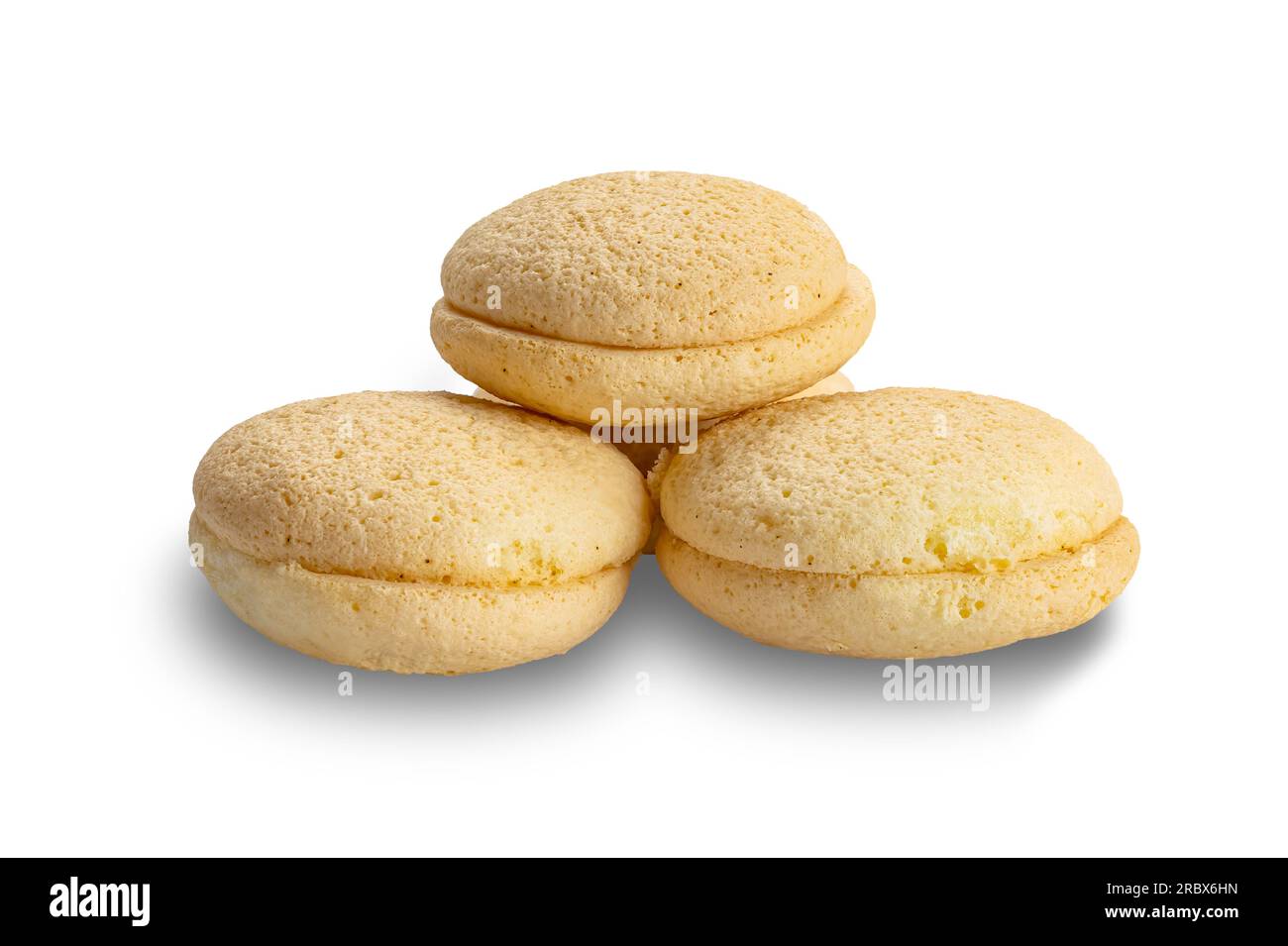 Pile of delicious homemade small round cake filled with pineapple jam ...