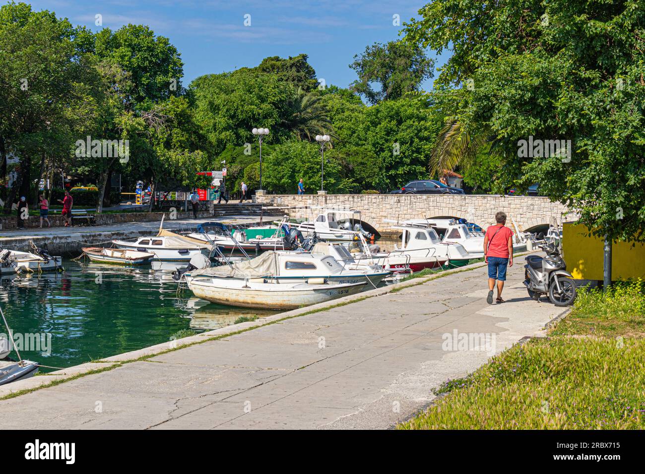 The sea canal, marina and three arch bridge between the island of ...