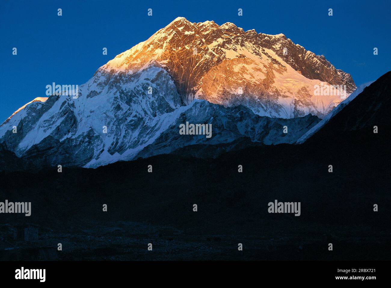 The magnificent view of Mt. Nuptse at sunset as seen from Pheriche ...