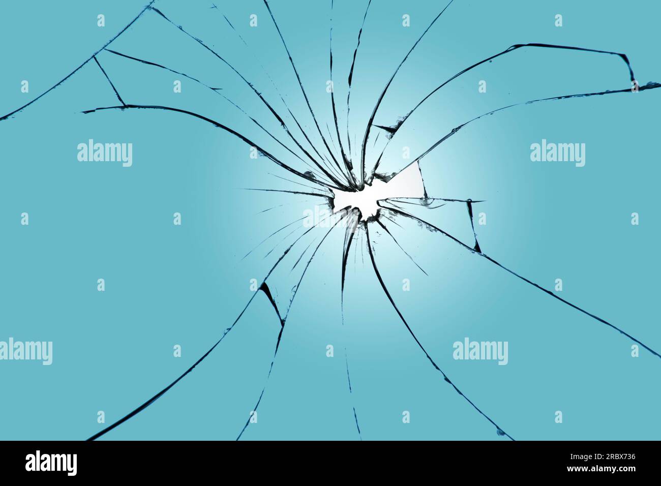 Cracked element on broken window, texture for design. A hole in the ...