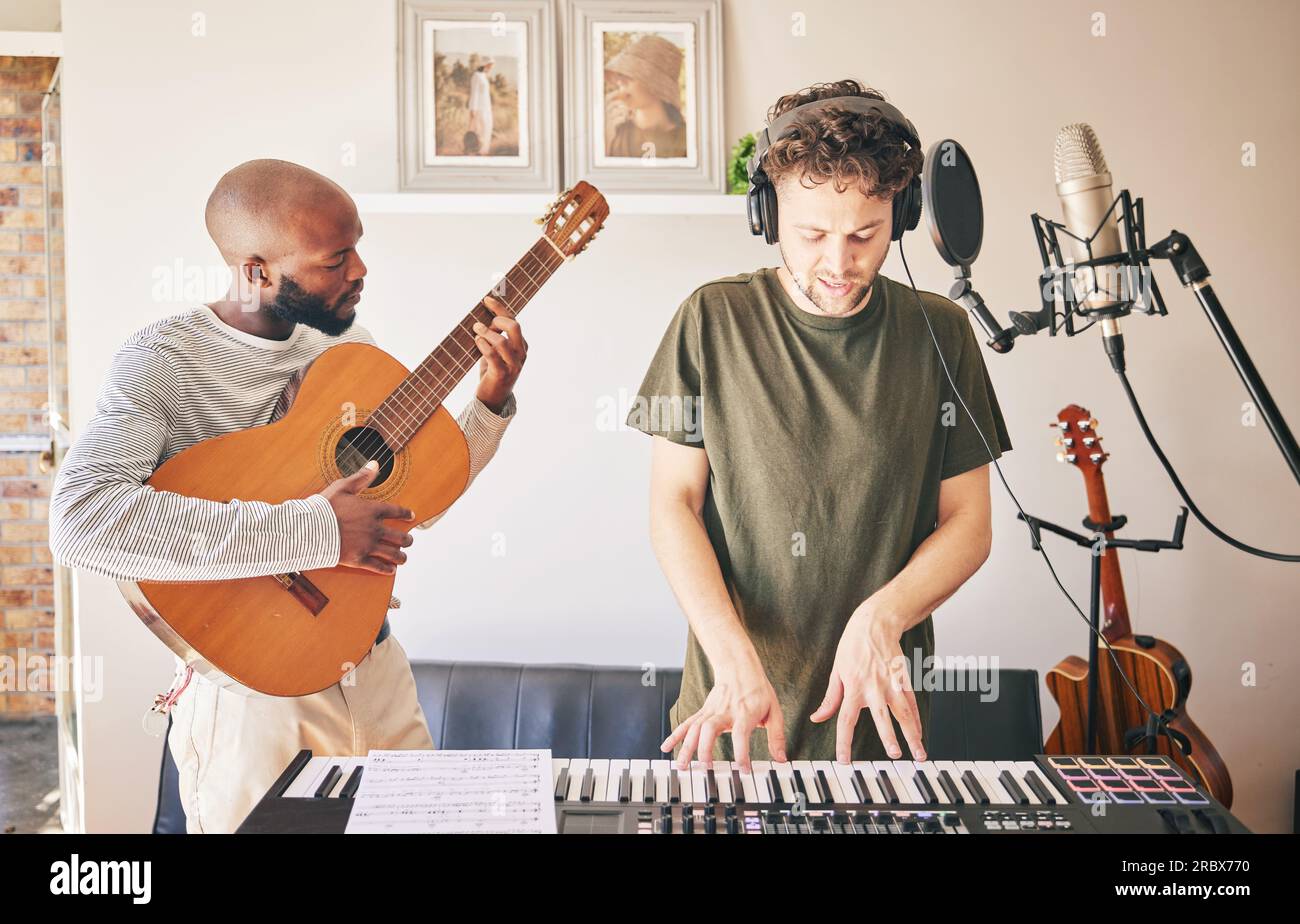 Music, piano and friends with guitar recording in home studio together ...