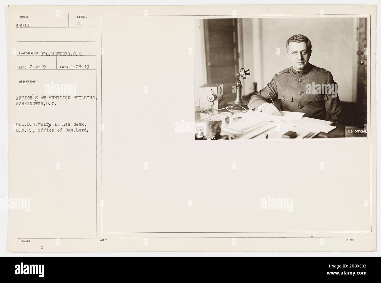 Colonel S. Wolfe at his desk in the Office of General Lord at the ...