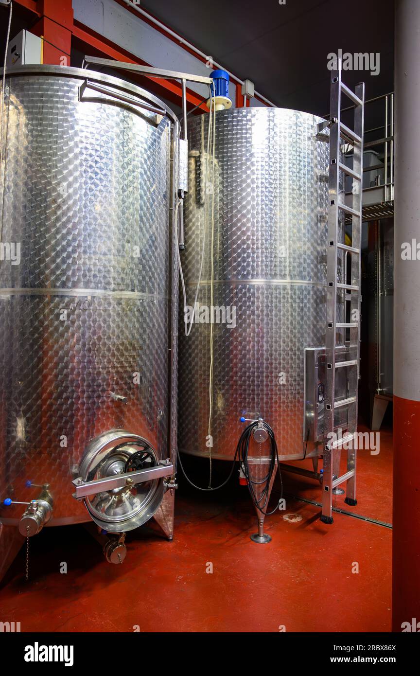 Modern bio wine production factory in Italy, inox steel tanks used for ...