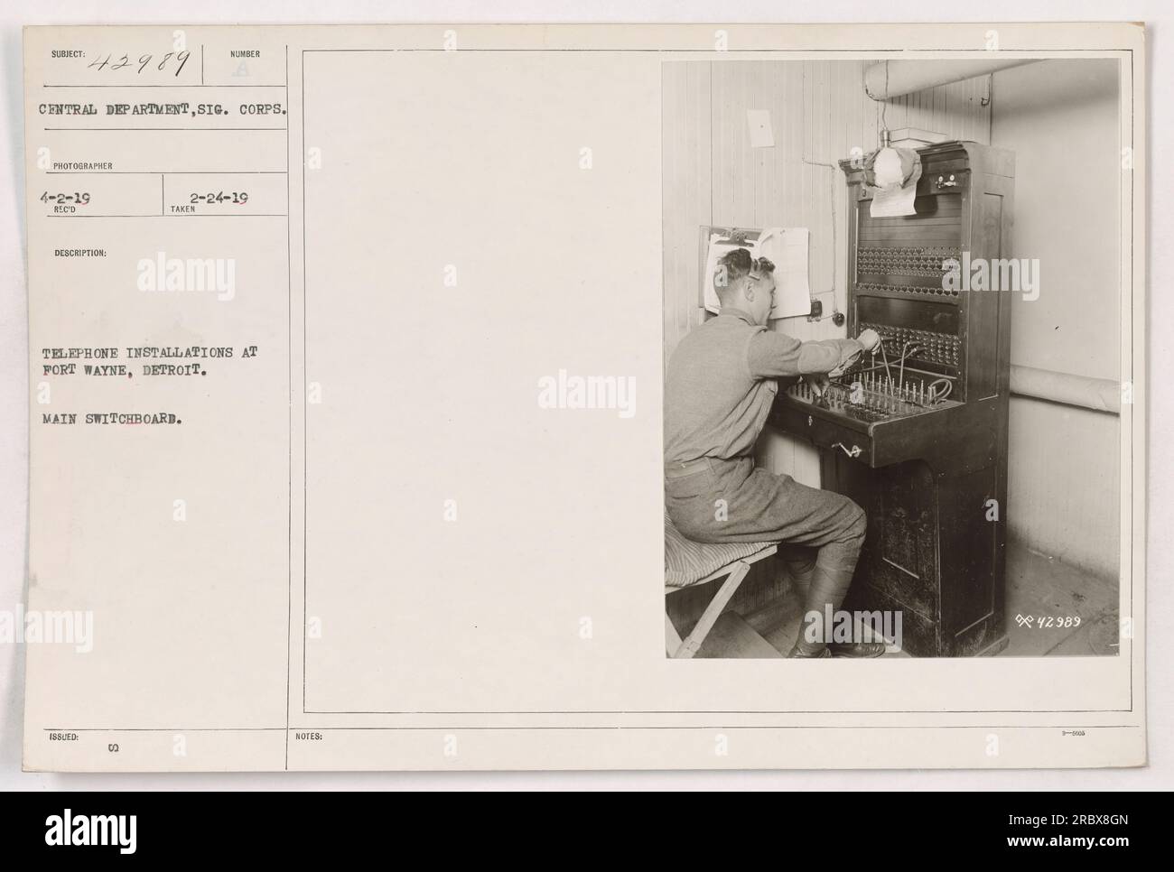 This photograph shows the main switchboard of the telephone ...
