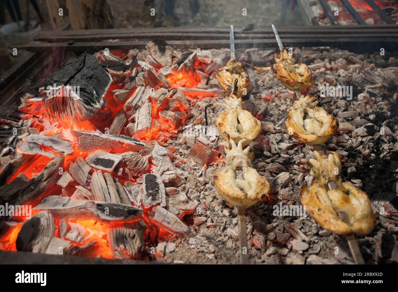 cuttlefish and eels on the spit, typical Sardinia recipe, Campidano ...