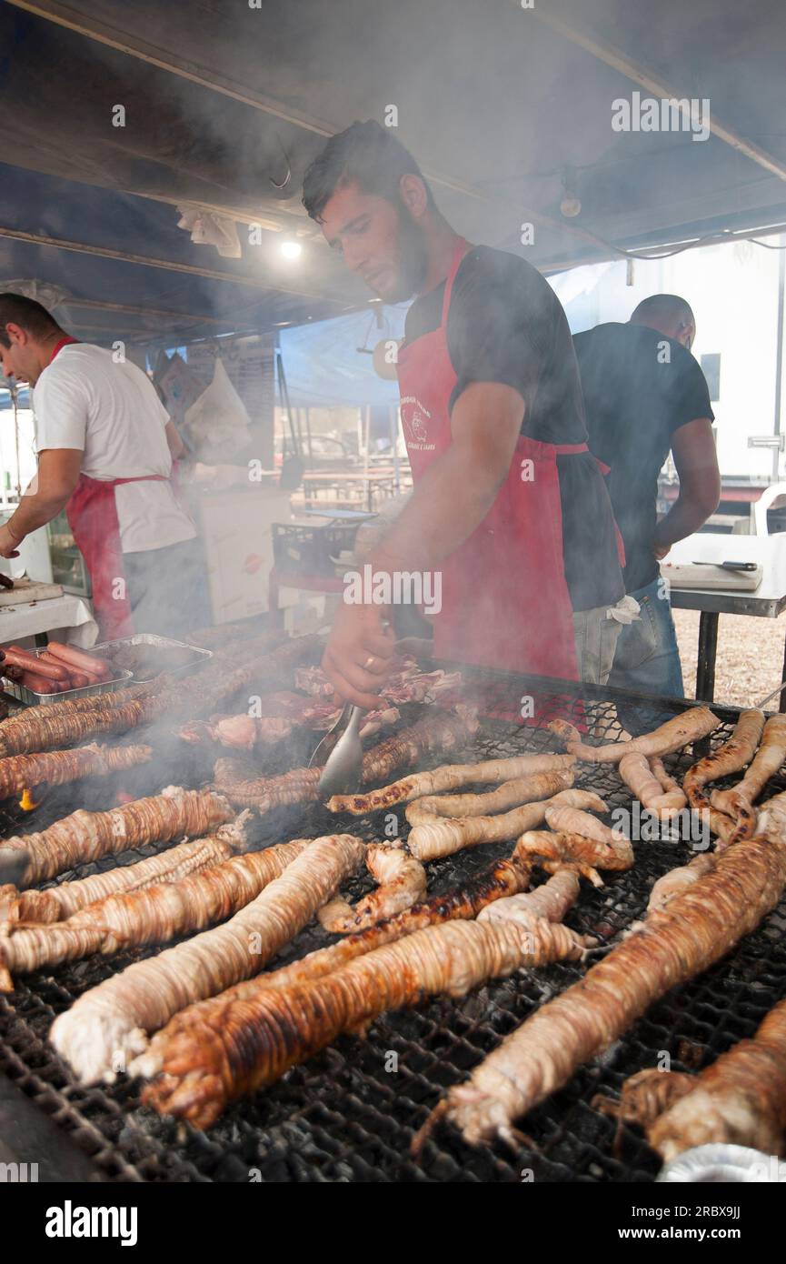 “Cordula” made up of braided and cooked kid or lamb intestines wrapped ...