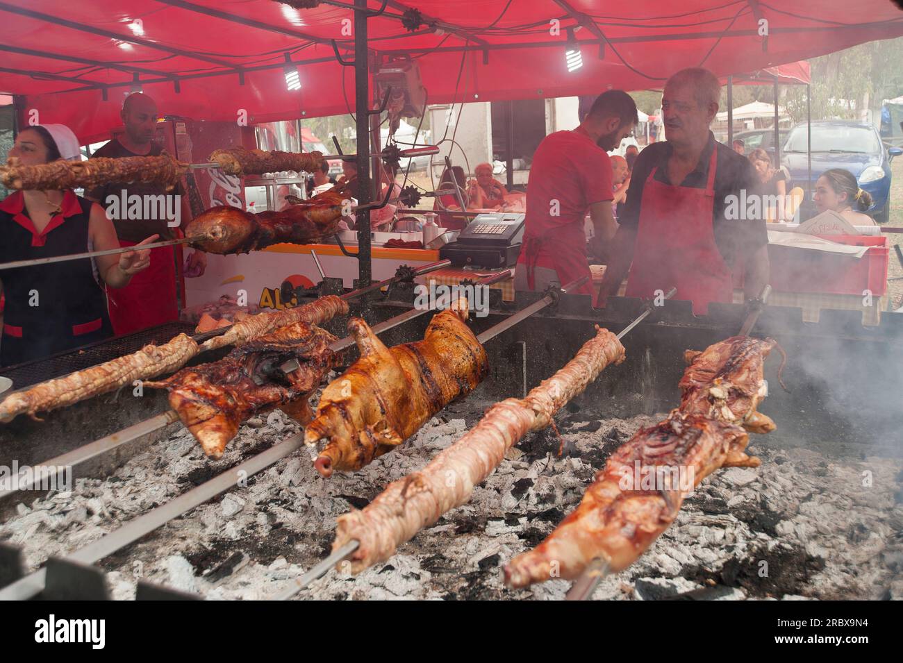 “Porceddu”, roast baby pork wrapped around a spit, “Cordula” made up of ...