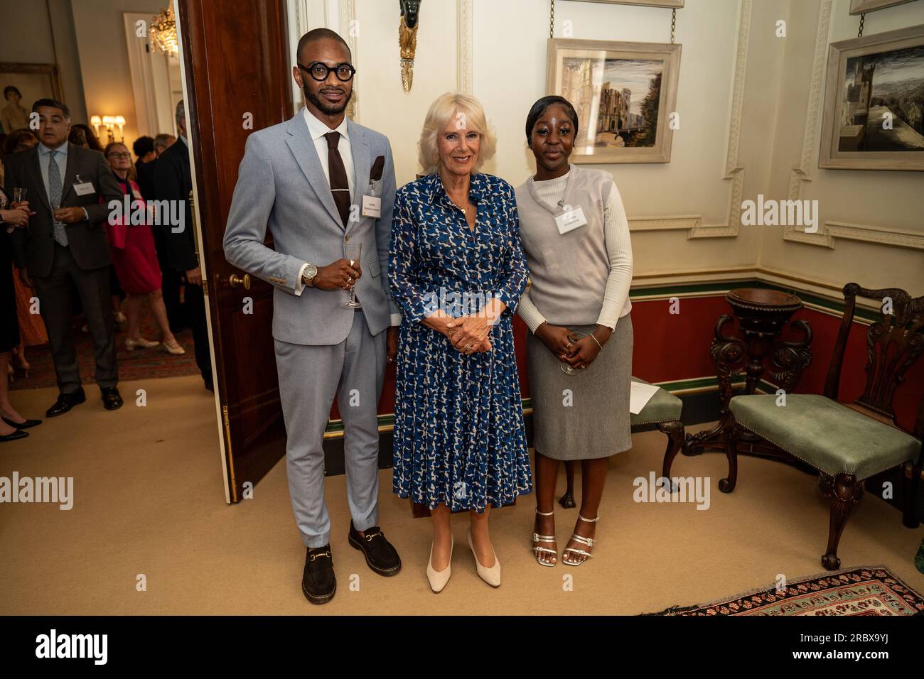 Queen Camilla with guests Ashley Hickson-Lovence and Daniella Koranteng ...