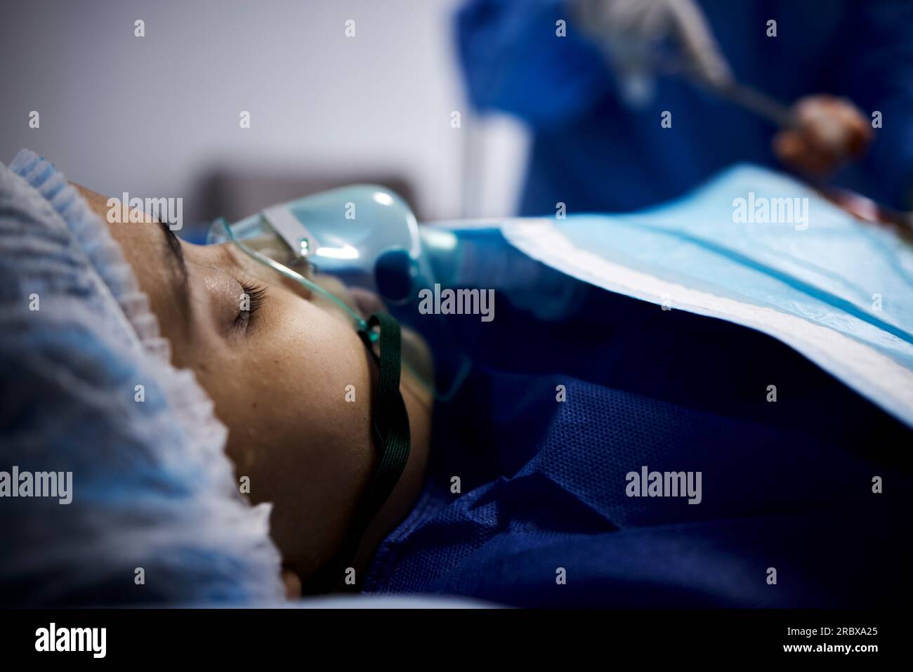 Doctor, sleeping or sick woman with an oxygen mask or respiratory for healthcare recovery in ...