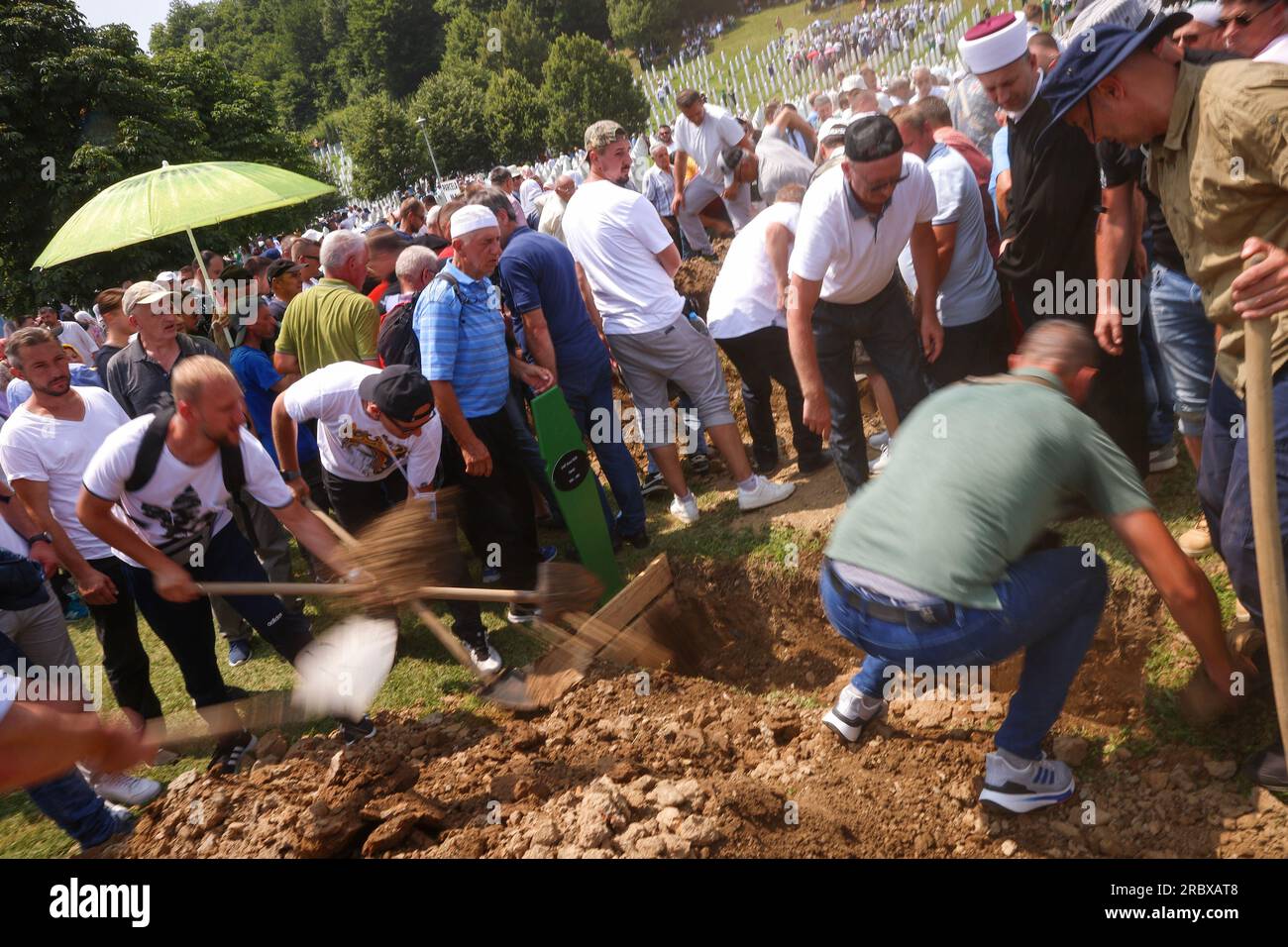 Potocari, Bosnia and Herzegovina. 11 July, 2023. Coffins of 30 more ...