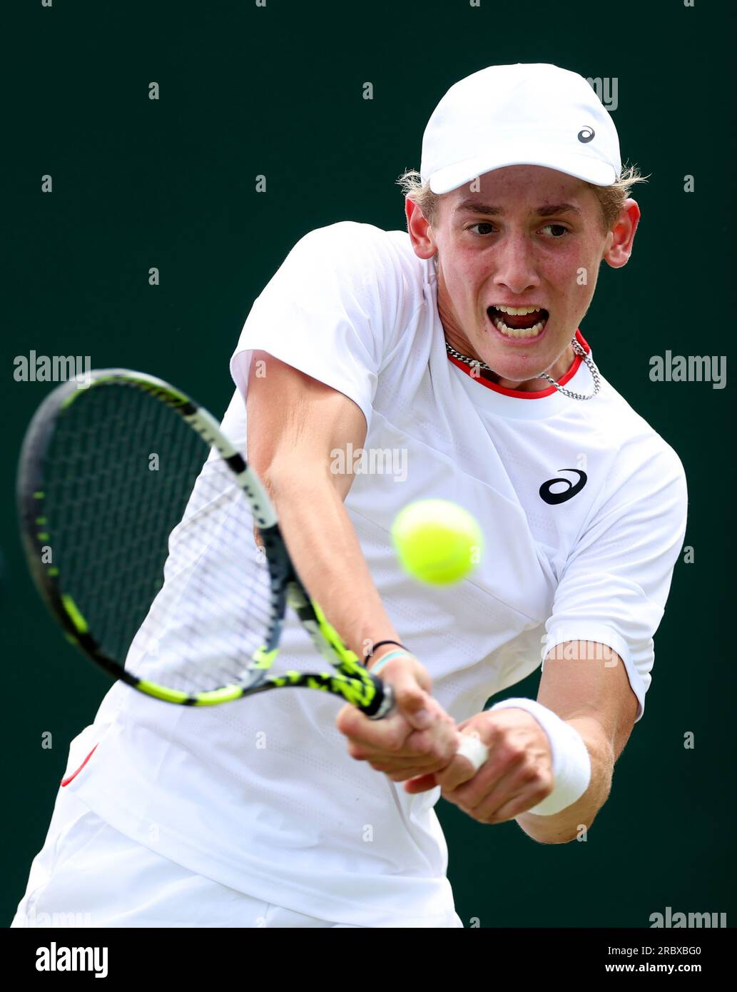 Henry Searle in action against Manas Dhamne (not pictured) on day nine ...