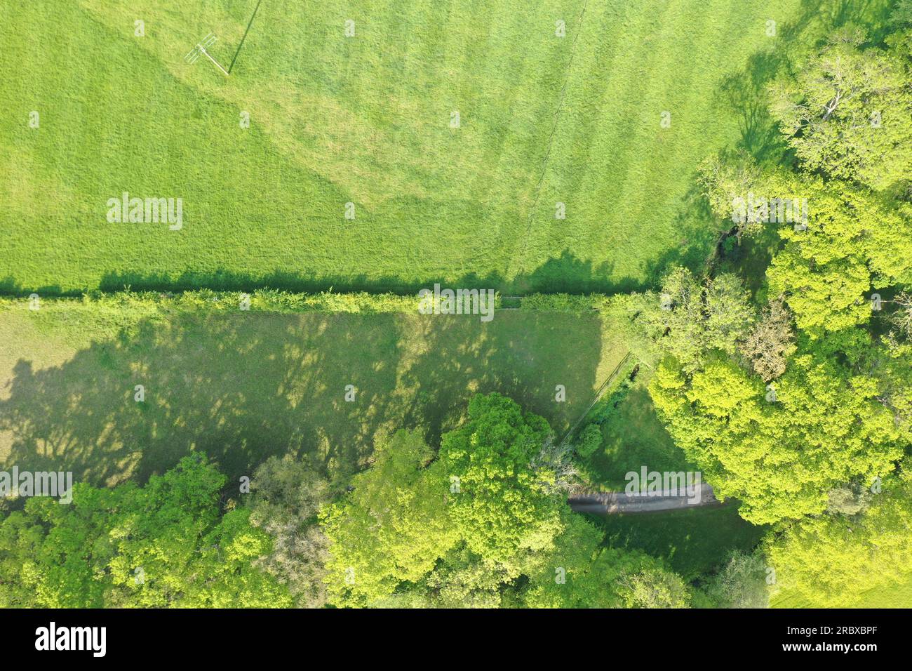 Drone perspective over green fields of Hook, Hampshire, England. Images ...