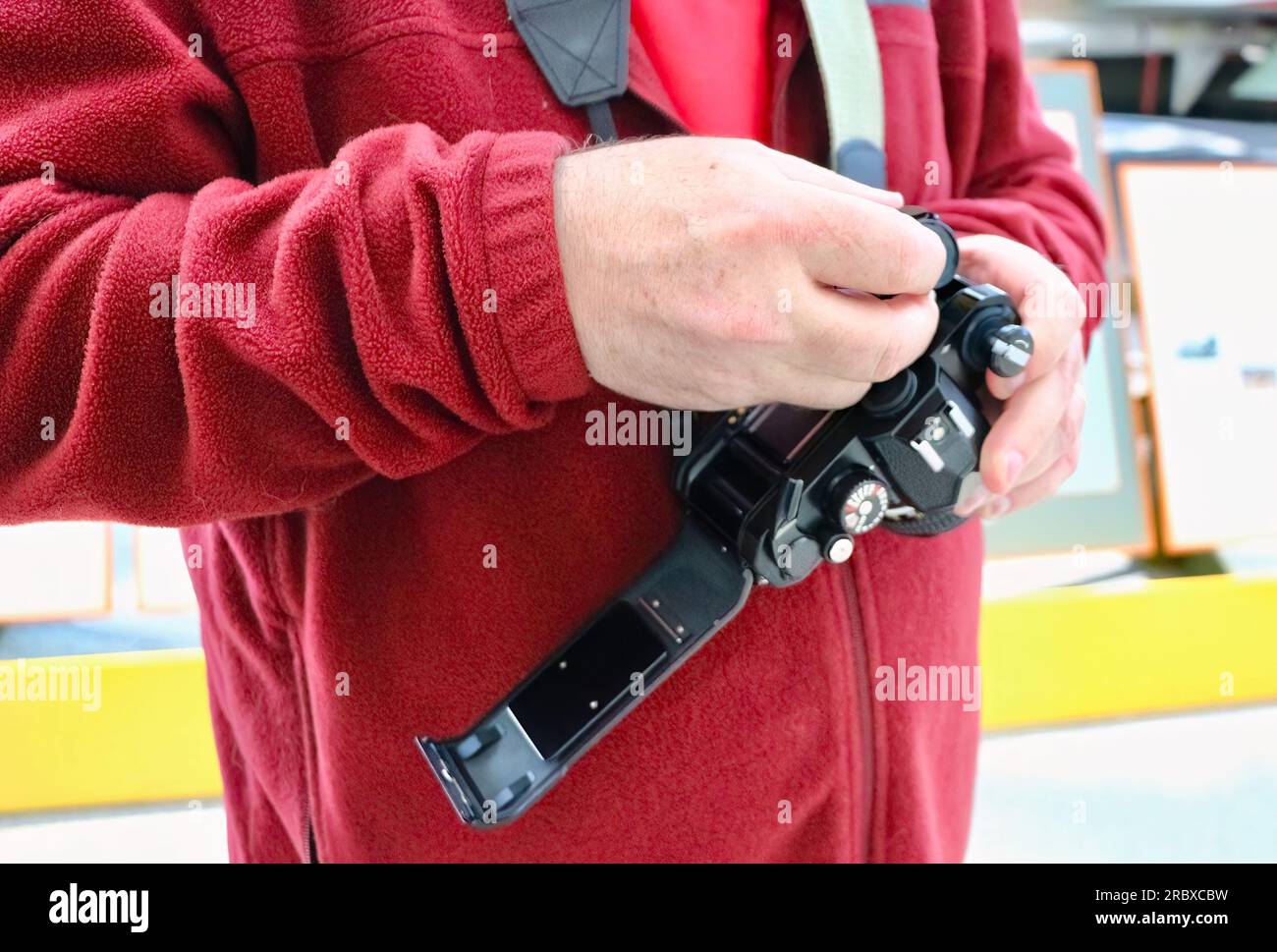 Series of photos showing the loading of a 35mm film into a Nikon Single ...