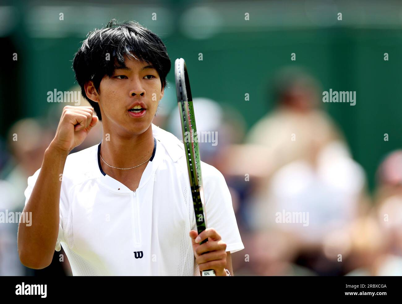 Yi Zhou reacts during his match against Henry Jefferson (not pictured) on day nine of the 2023 ...