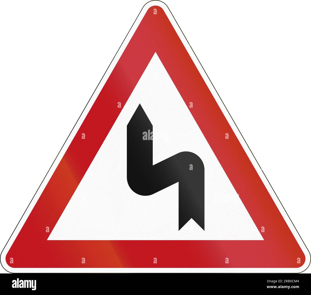 German sign warning about a left curve Stock Photo - Alamy