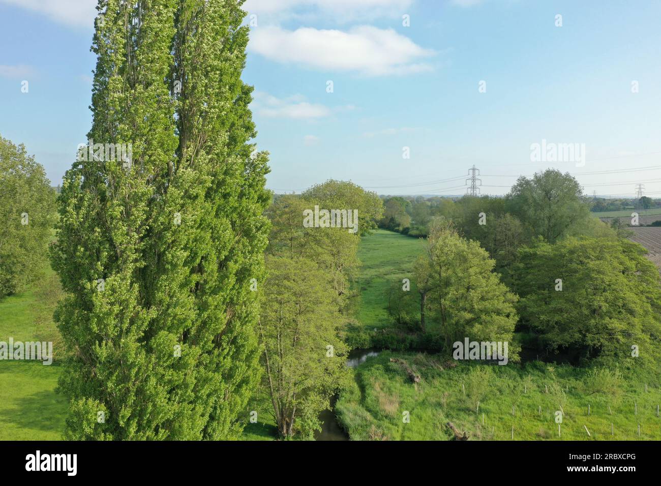 Drone perspective over green fields of Hook, Hampshire, England. Images ...