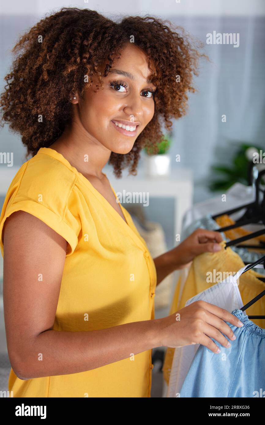 home woman choosing her fashion outfit in dressing room Stock Photo - Alamy