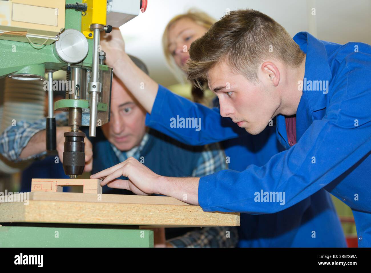 student operating a cnc router machine Stock Photo - Alamy