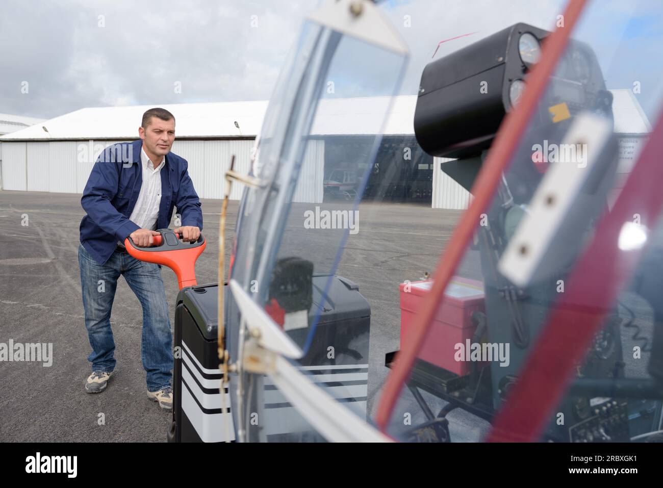a helicopter male at work Stock Photo - Alamy