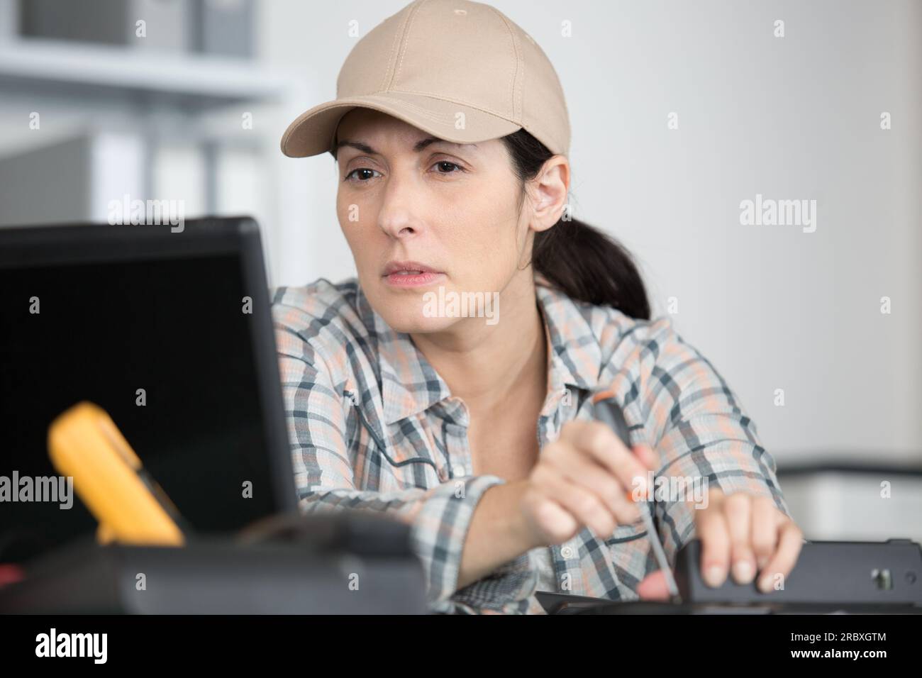 Hand female professional scanning hi-res stock photography and images ...