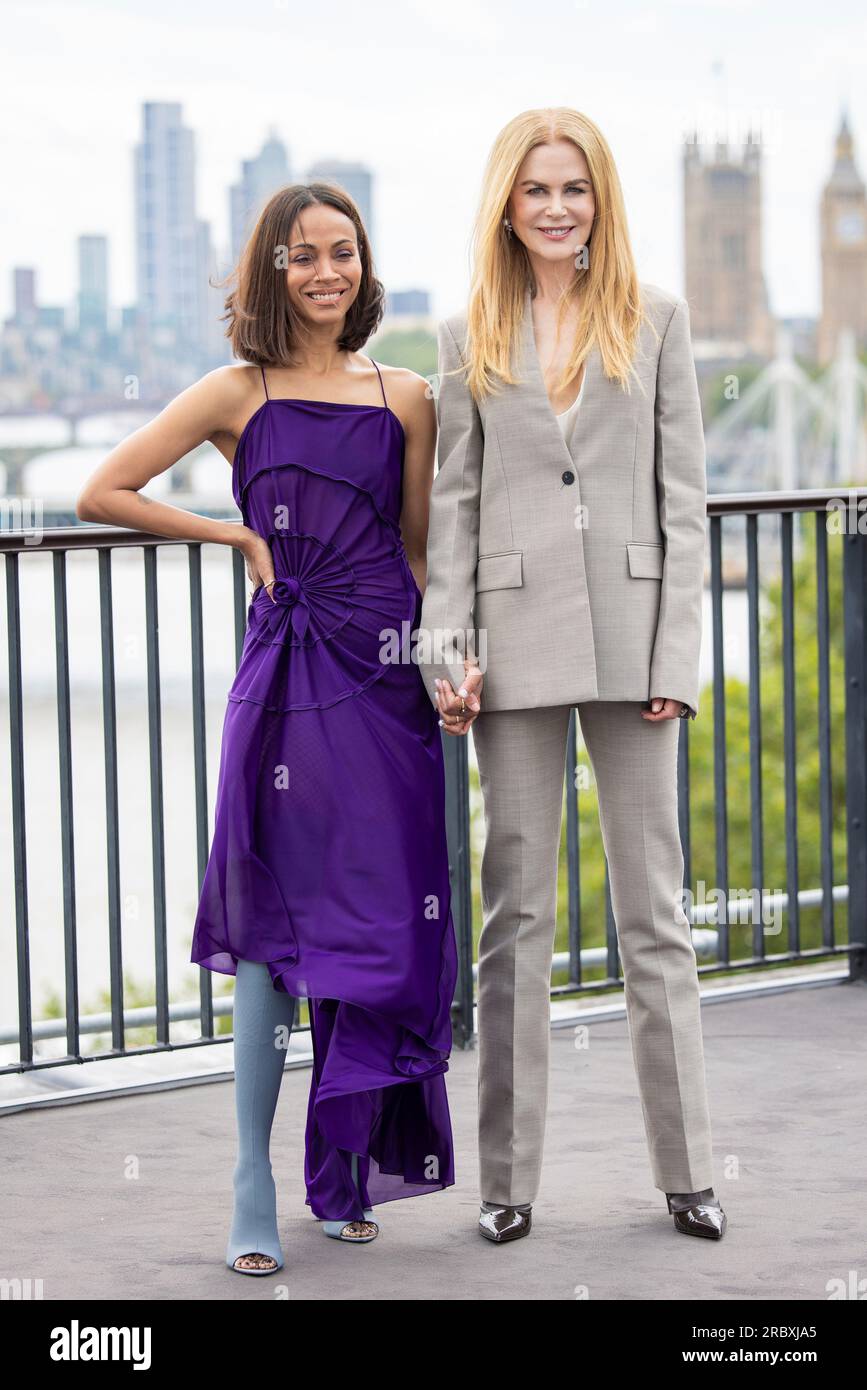 Zoe Saldana, left, and Nicole Kidman pose for photographers during a ...