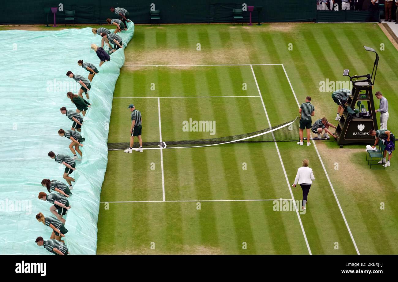 Rain covers on court one as rain stops play on day nine of the 2023 ...