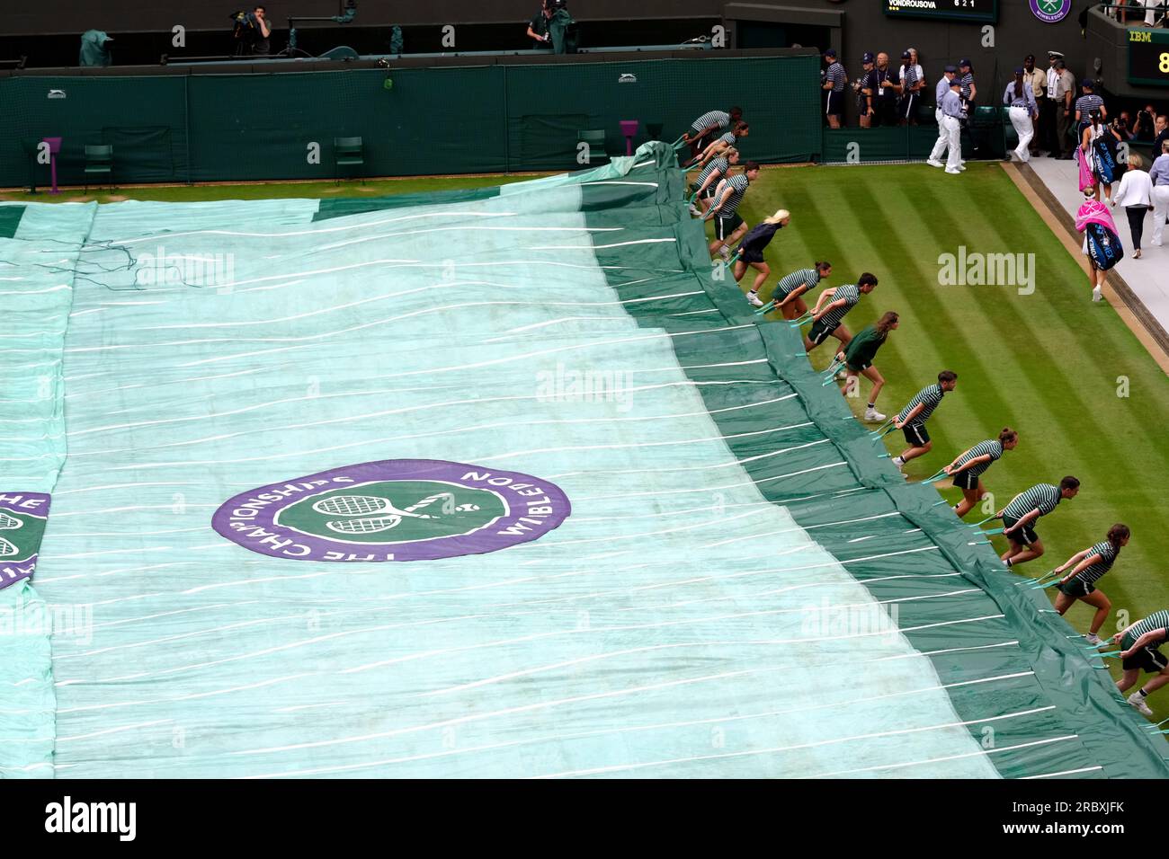 Rain covers on court one as rain stops play on day nine of the 2023 ...