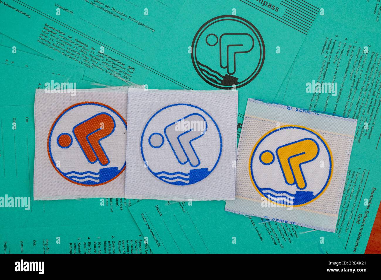 11 July 2023, Bavaria, Grafing Bei München: A German swimming passport ...