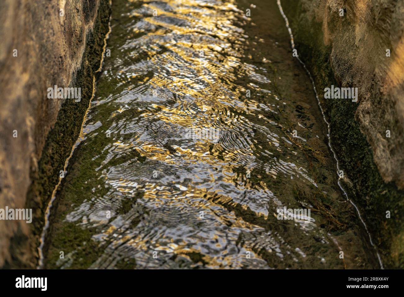 Al falaj water channel close up Stock Photo - Alamy