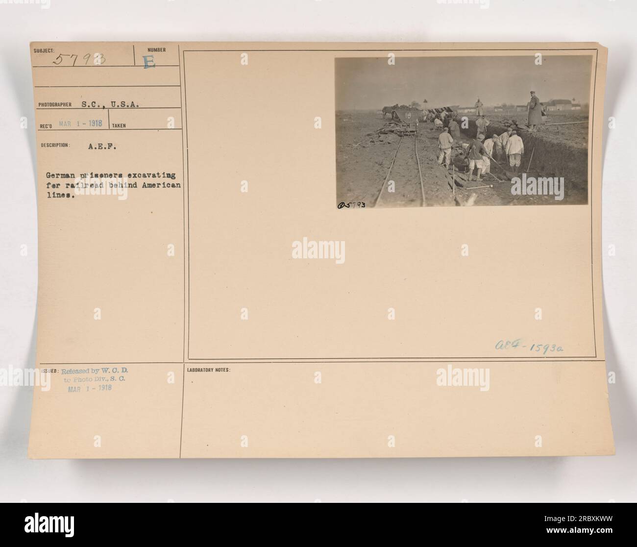 German prisoners of war are seen working on the construction of a ...