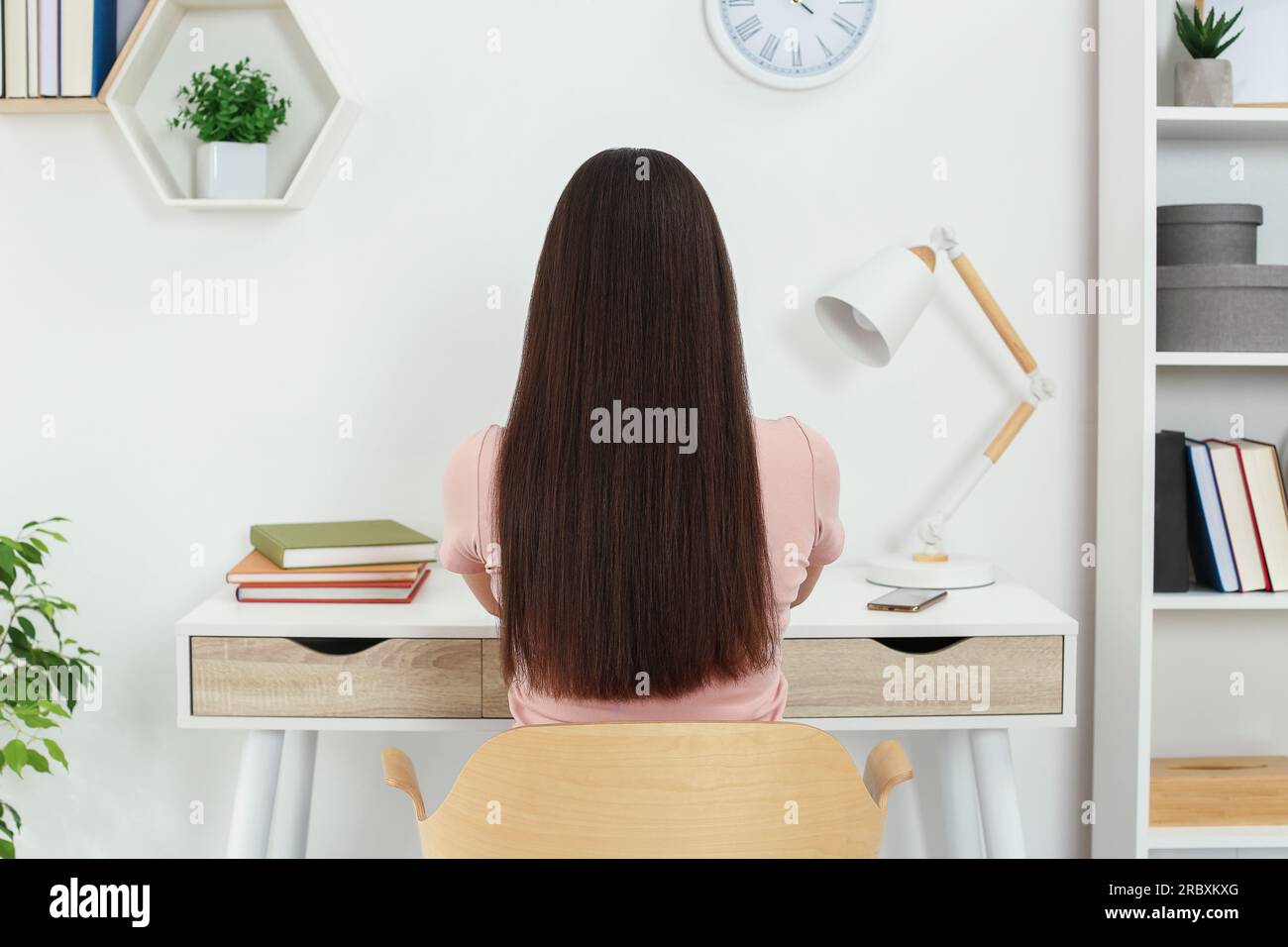 Back view beautiful girl working hi-res stock photography and images ...