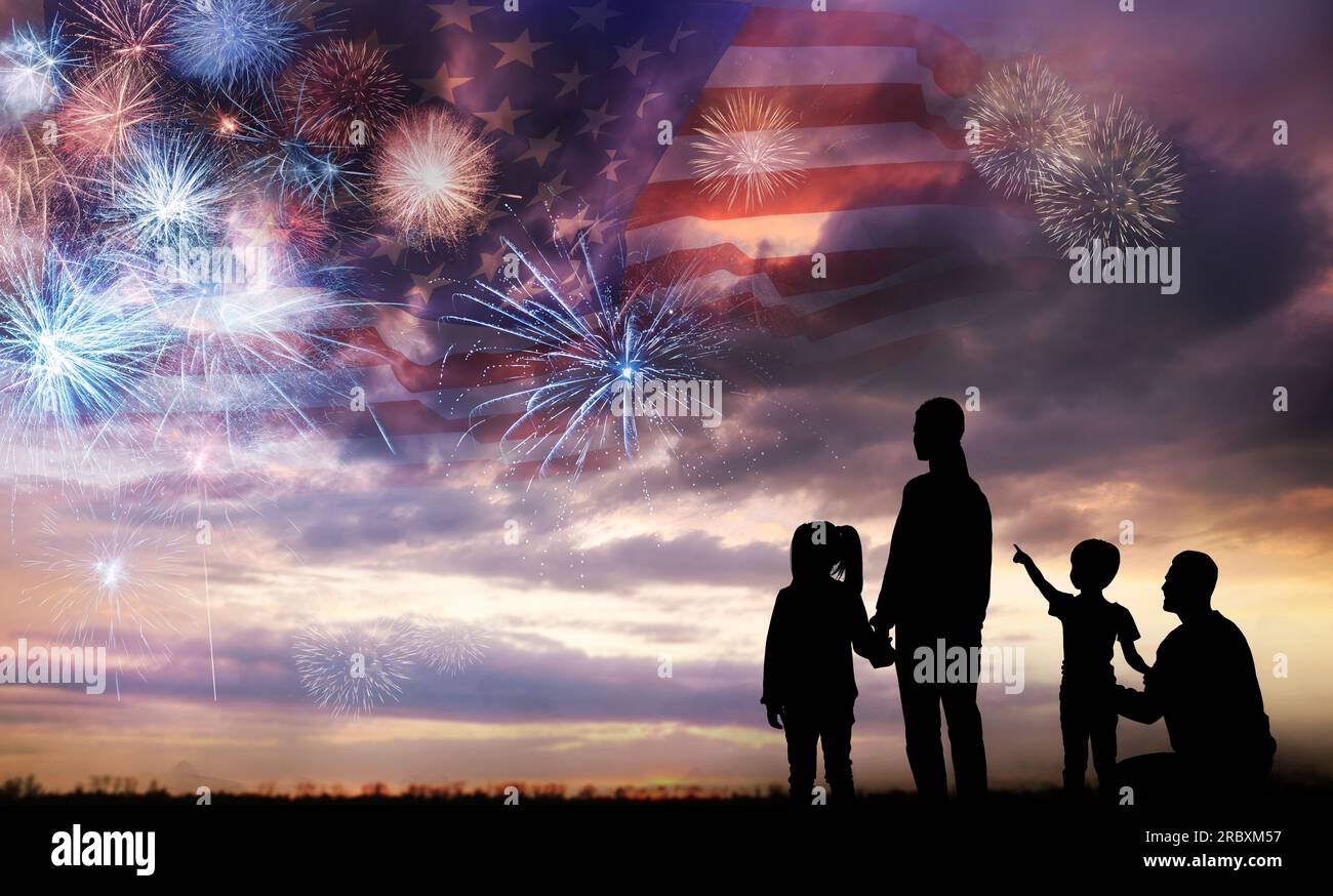 4th of July - Independence day of America. Family enjoying fireworks in ...