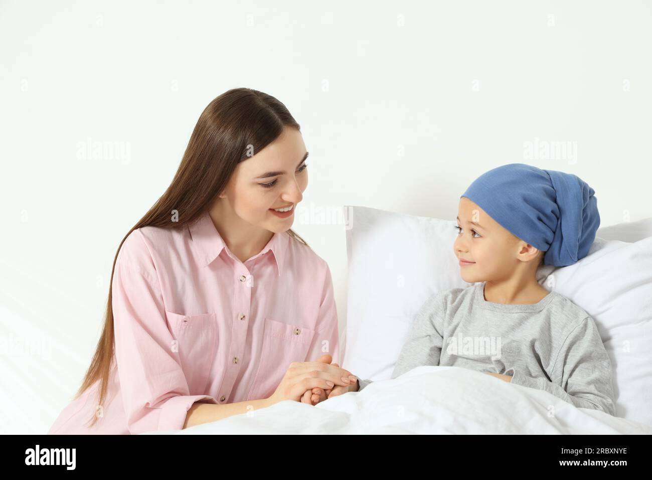 Childhood cancer. Mother and daughter in hospital Stock Photo - Alamy