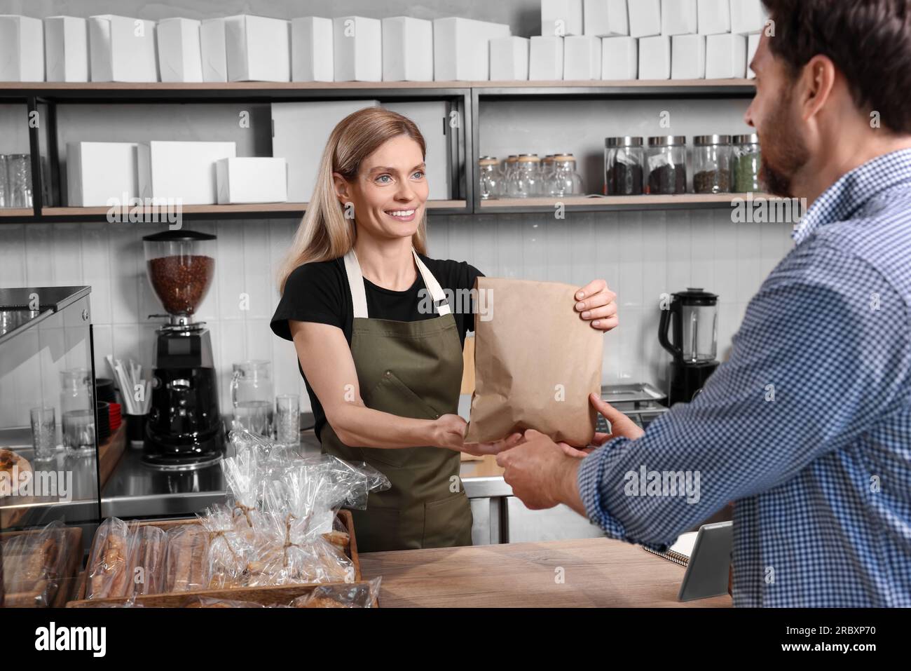 Man in confectionery shop hi-res stock photography and images - Alamy